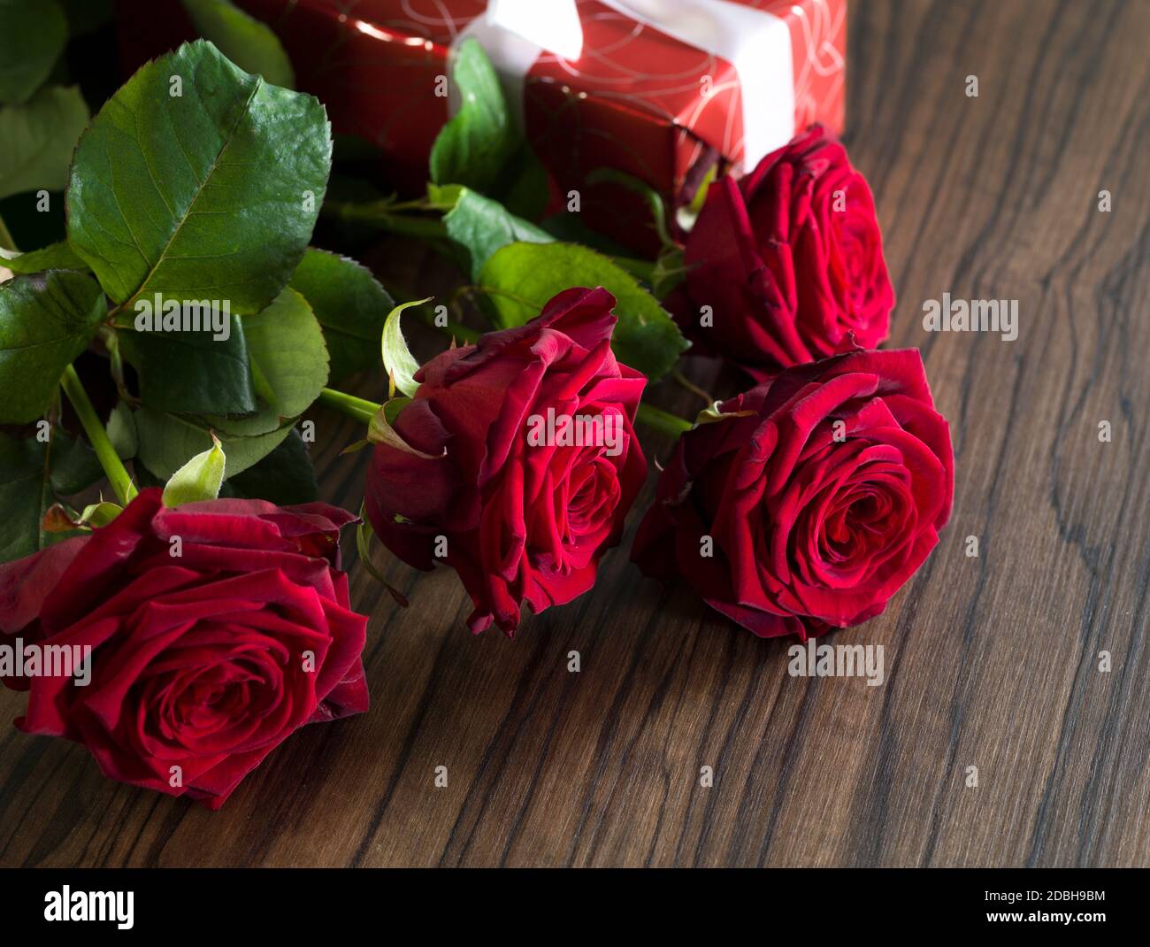 Kraft Gift box with beautiful red ribbon and rose, concept of Valentine ...