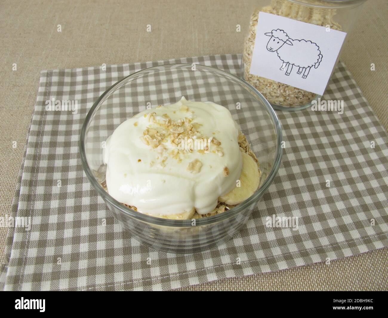 Breakfast with sheep quark, rolled oats and banana Stock Photo - Alamy