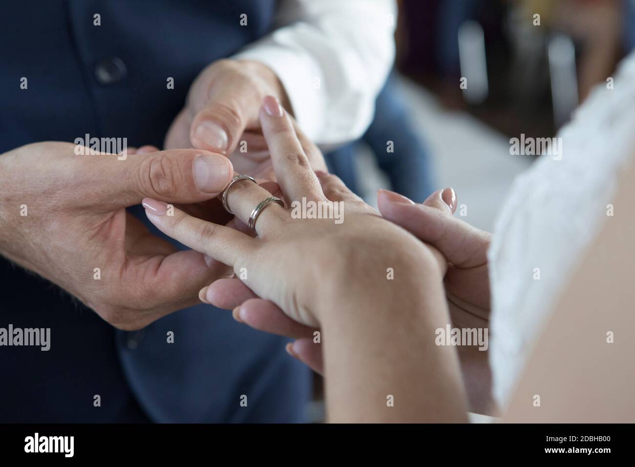 Close up wedding ceremony. Groom Giving Wedding Ring To his bride Stock ...