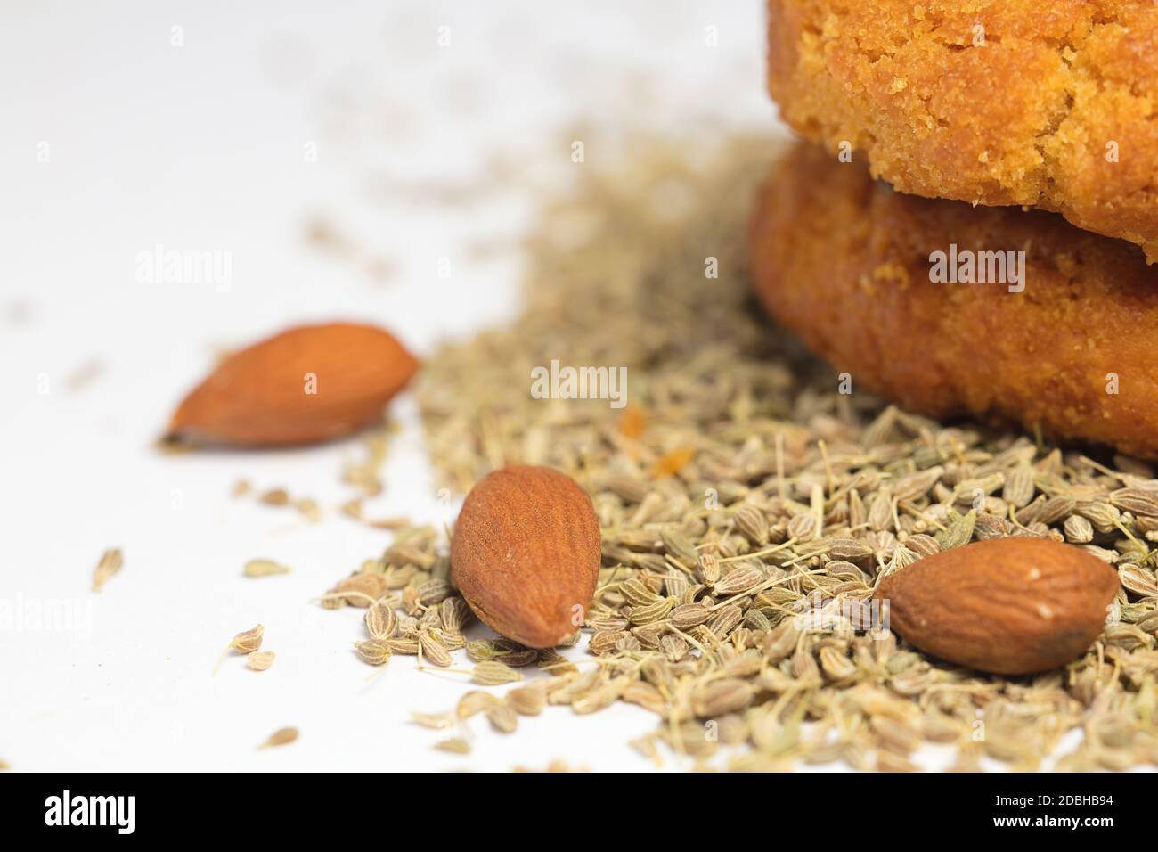 almonds (without shell) and sesame, homemade cookies, white background ...