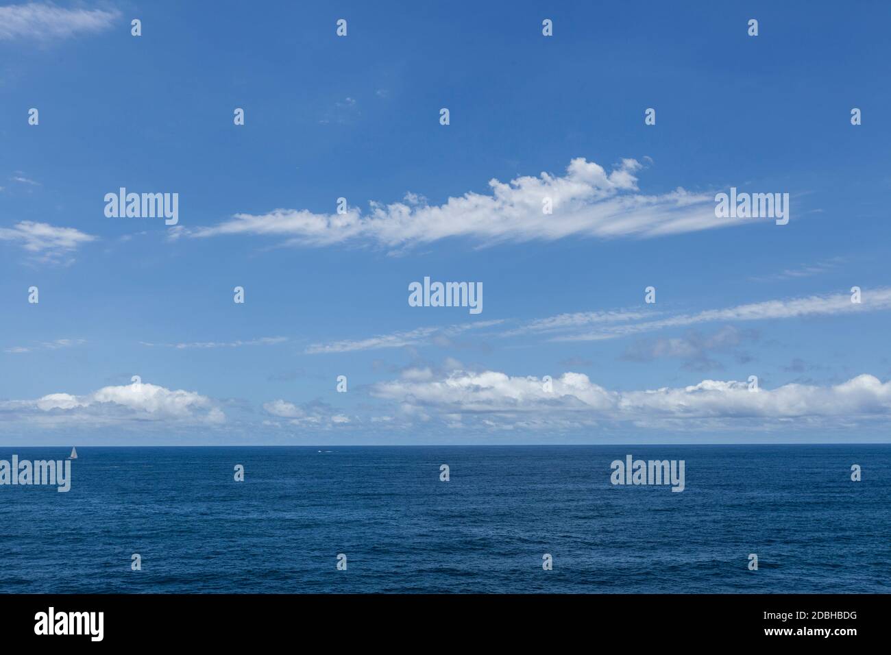 perfect sky, sailing boat and water of ocean Stock Photo - Alamy