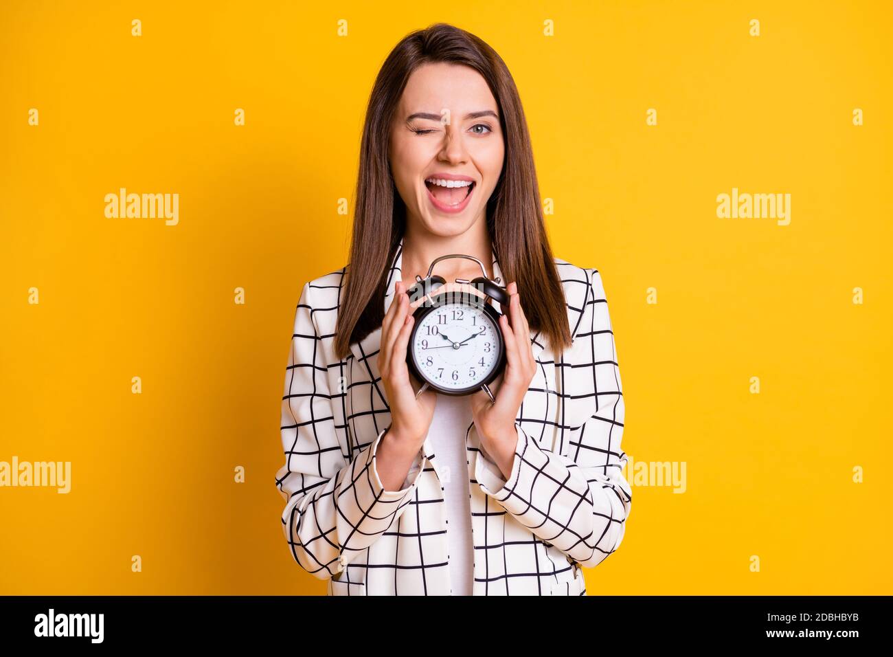 Photo of shiny pretty girl lady dressed plaid blazer blinking holding ...