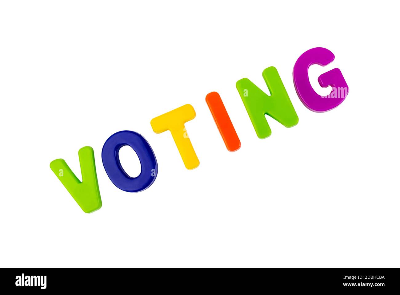 Text VOTING written in plastic letters on a white background. Concept ...