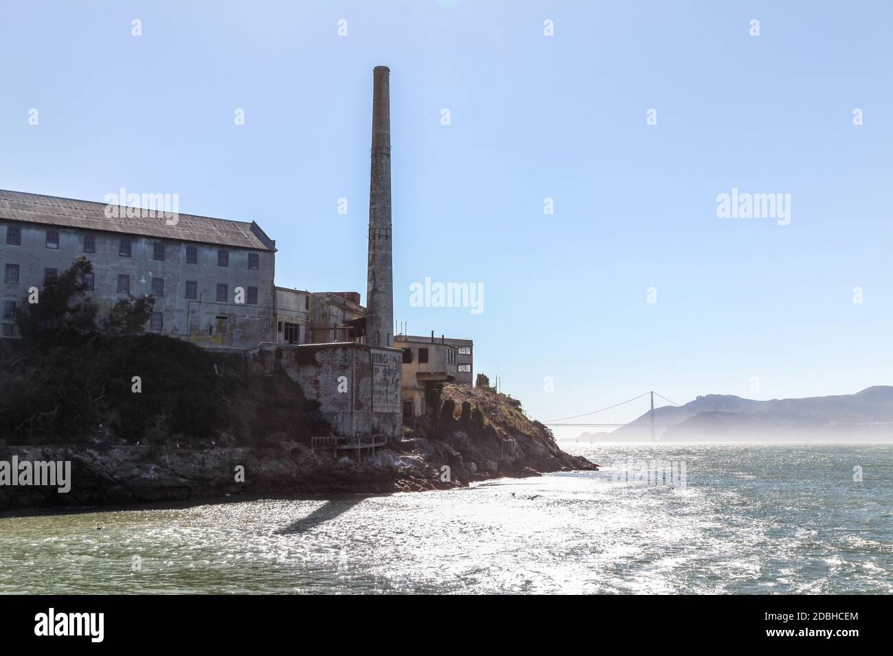 The Alcatraz prison in San Francisco with Golden Gate Bridge behind ...
