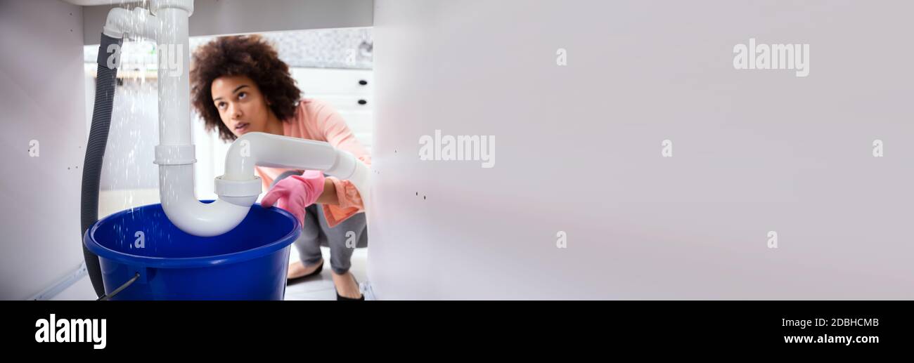 Leaky Sink Pipe Leaking. Water Leak Problem Stock Photo - Alamy