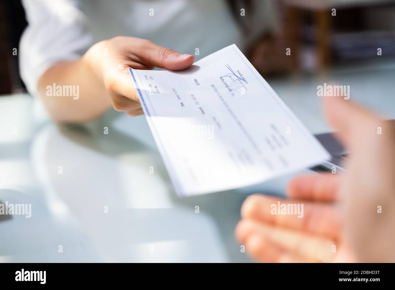 Hand Giving Payroll Compensation Paycheck. Salary Cheque Stock Photo ...