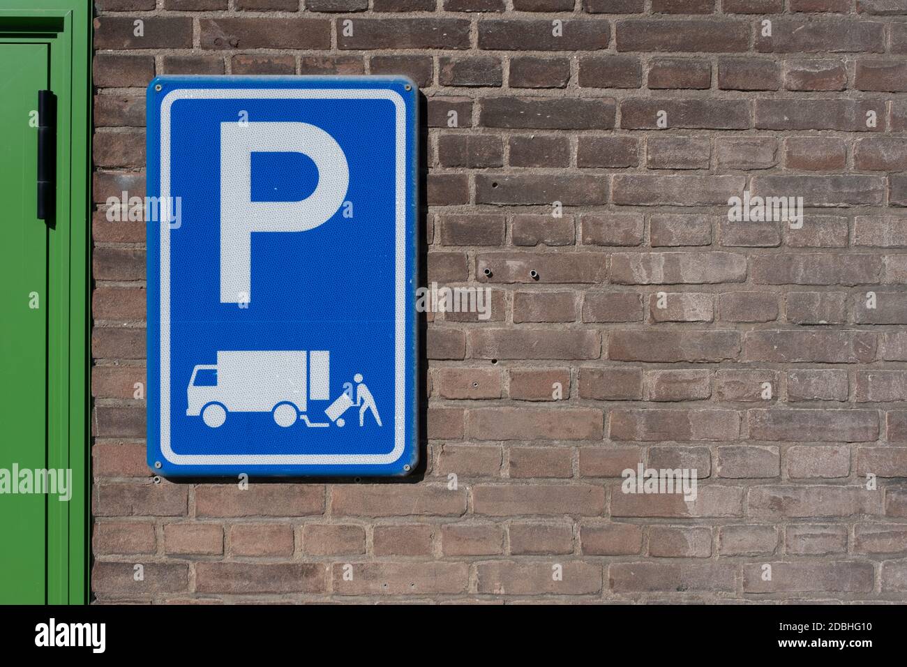 Dutch road sign: parking permitted for the immediate loading and ...