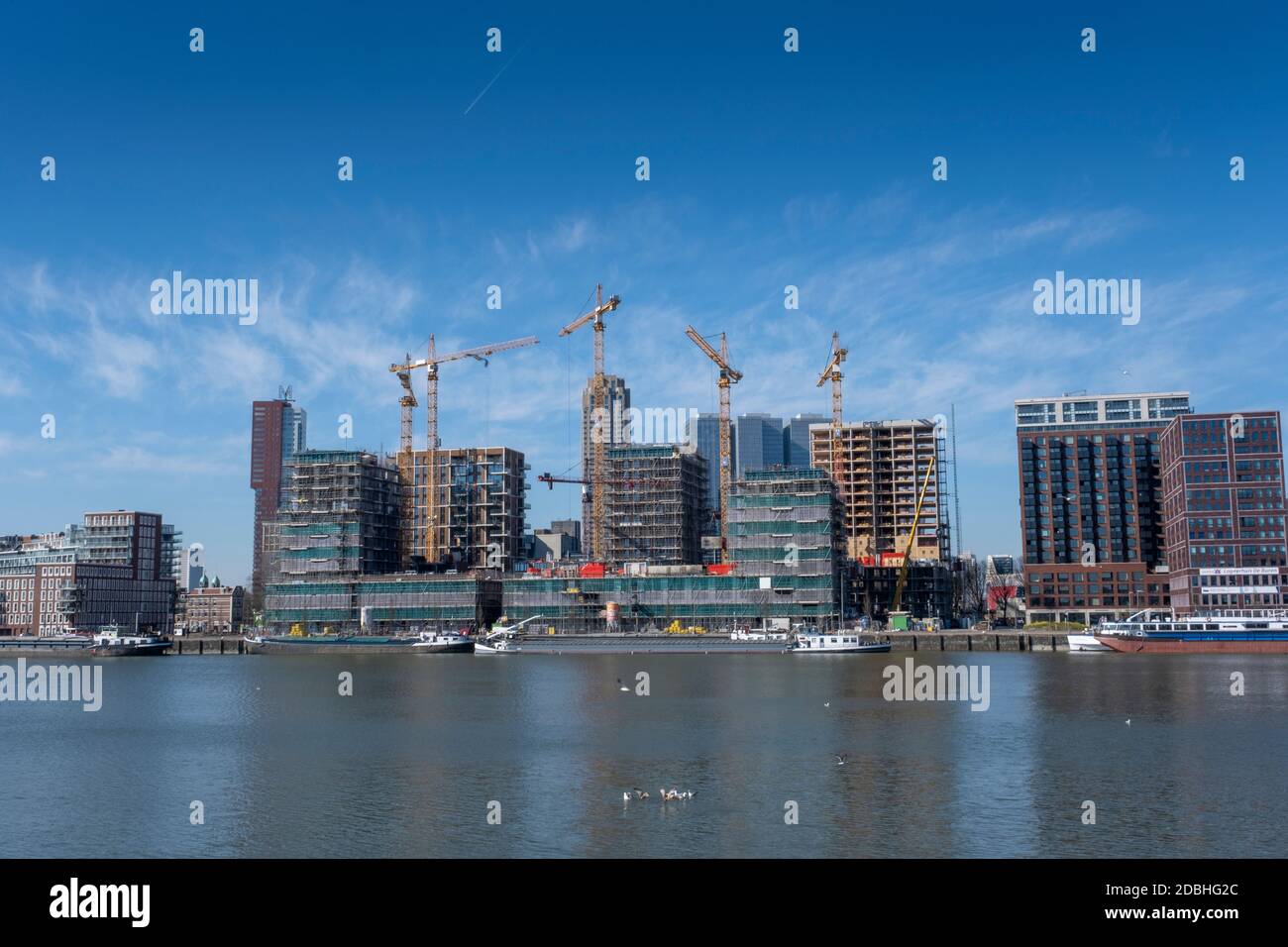 High rise building under construction in evening sky in Rotterdam, The ...