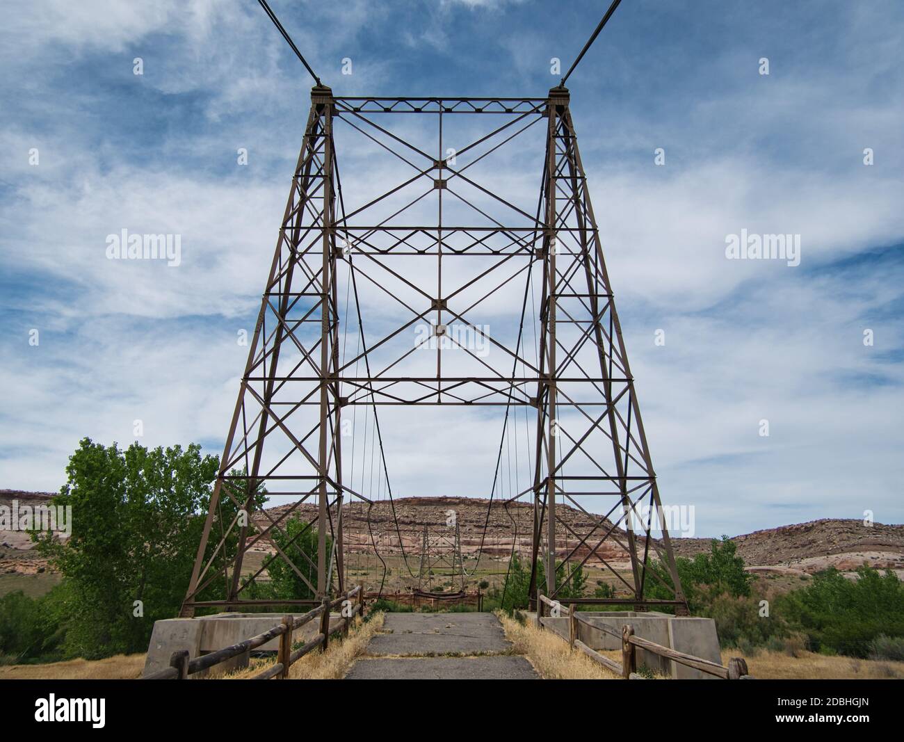 A very old and partially collapsed steel suspension bridge Stock Photo ...