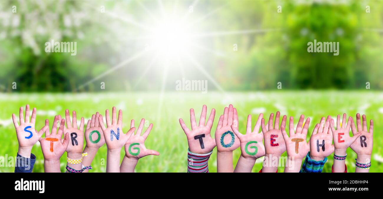 Children Hands Building Colorful Word Strong Together. Green Grass ...