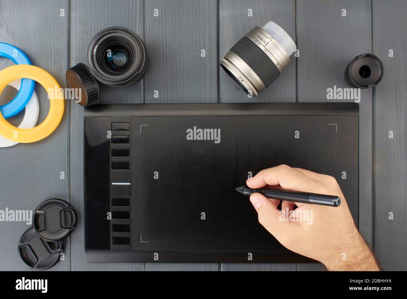 Graphic design graphic tablet and photo retouching with camera lenses ...