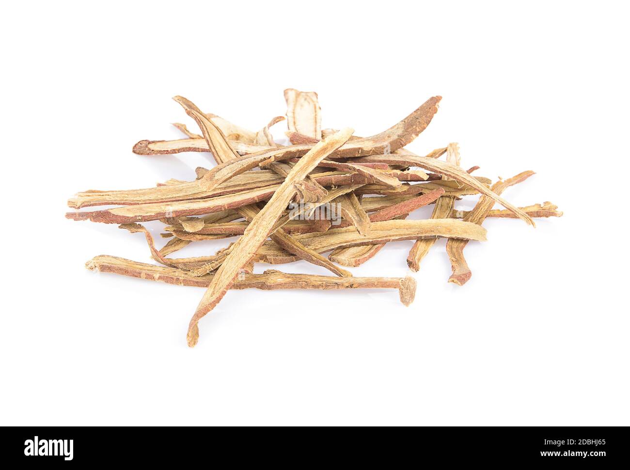 Slice liquorice root on white background Stock Photo - Alamy