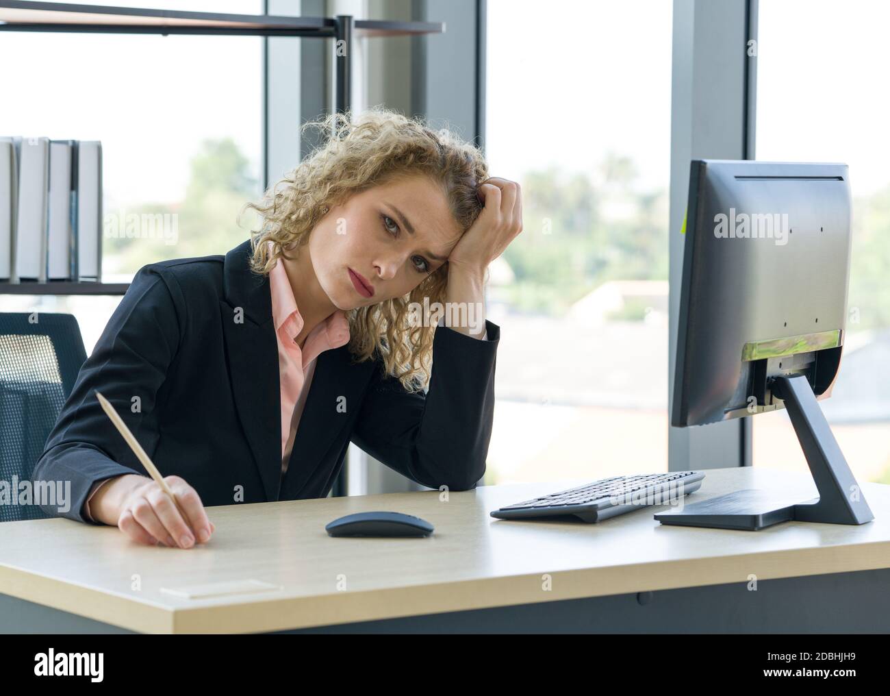 Morning work atmosphere In a modern office. Ukrainian employee hold the ...