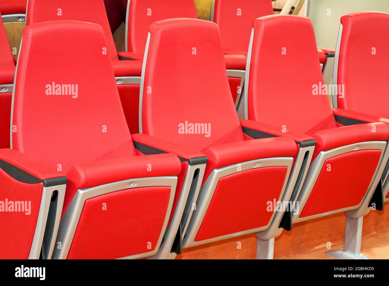 Conference chairs in rows with red textile Stock Photo - Alamy