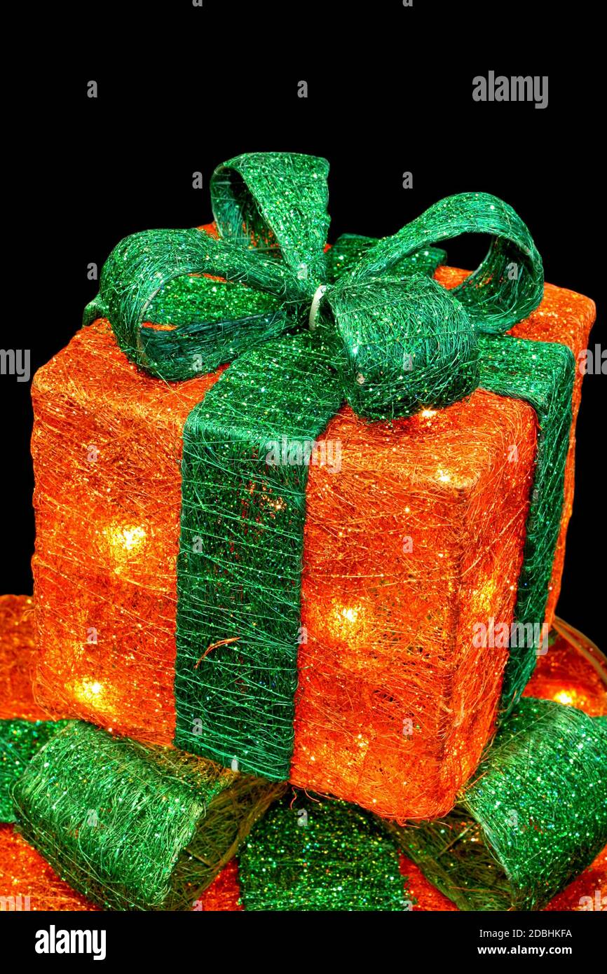 Big orange gift box with green bow Stock Photo - Alamy