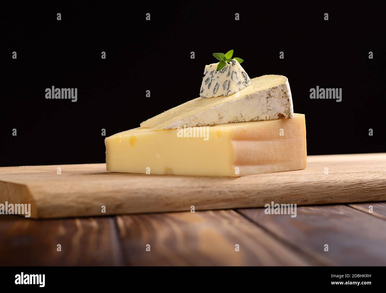 Wedges of cheese on tray Stock Photo - Alamy