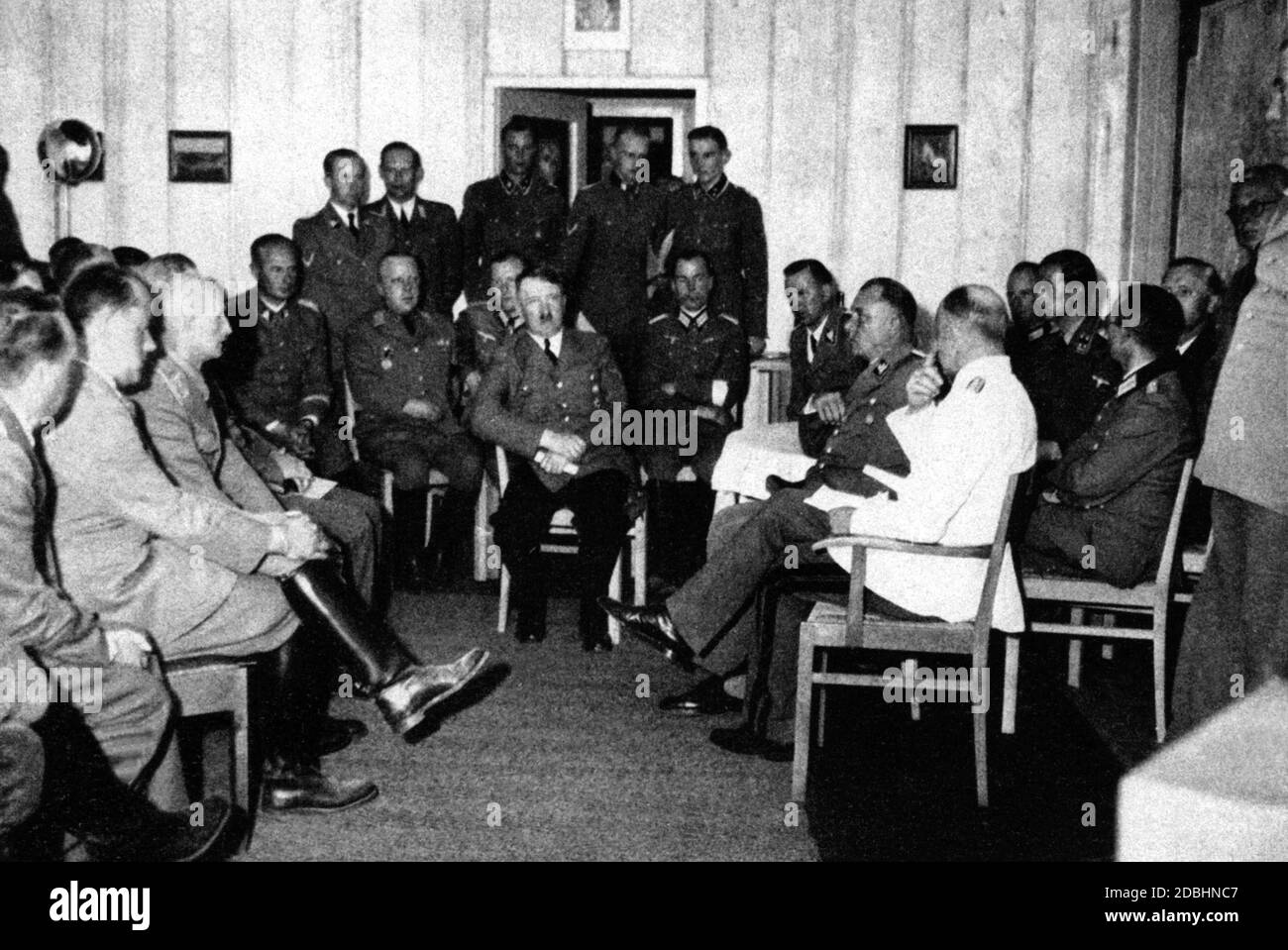 Hitler and his entourage, (to his right Julius Schaub and Martin ...