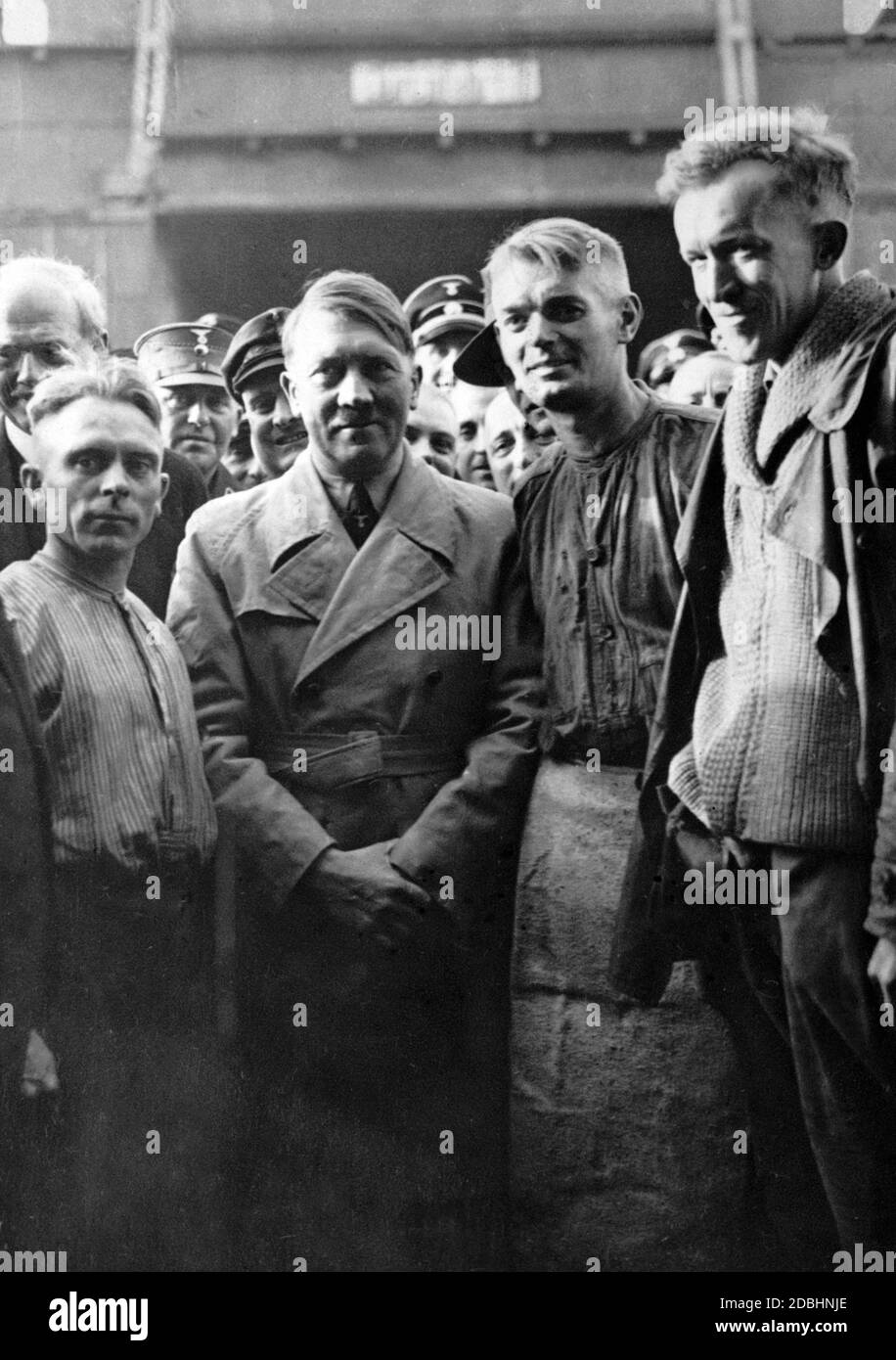 "The Nazi propaganda staged Adolf Hitler as a labor leader on the ...