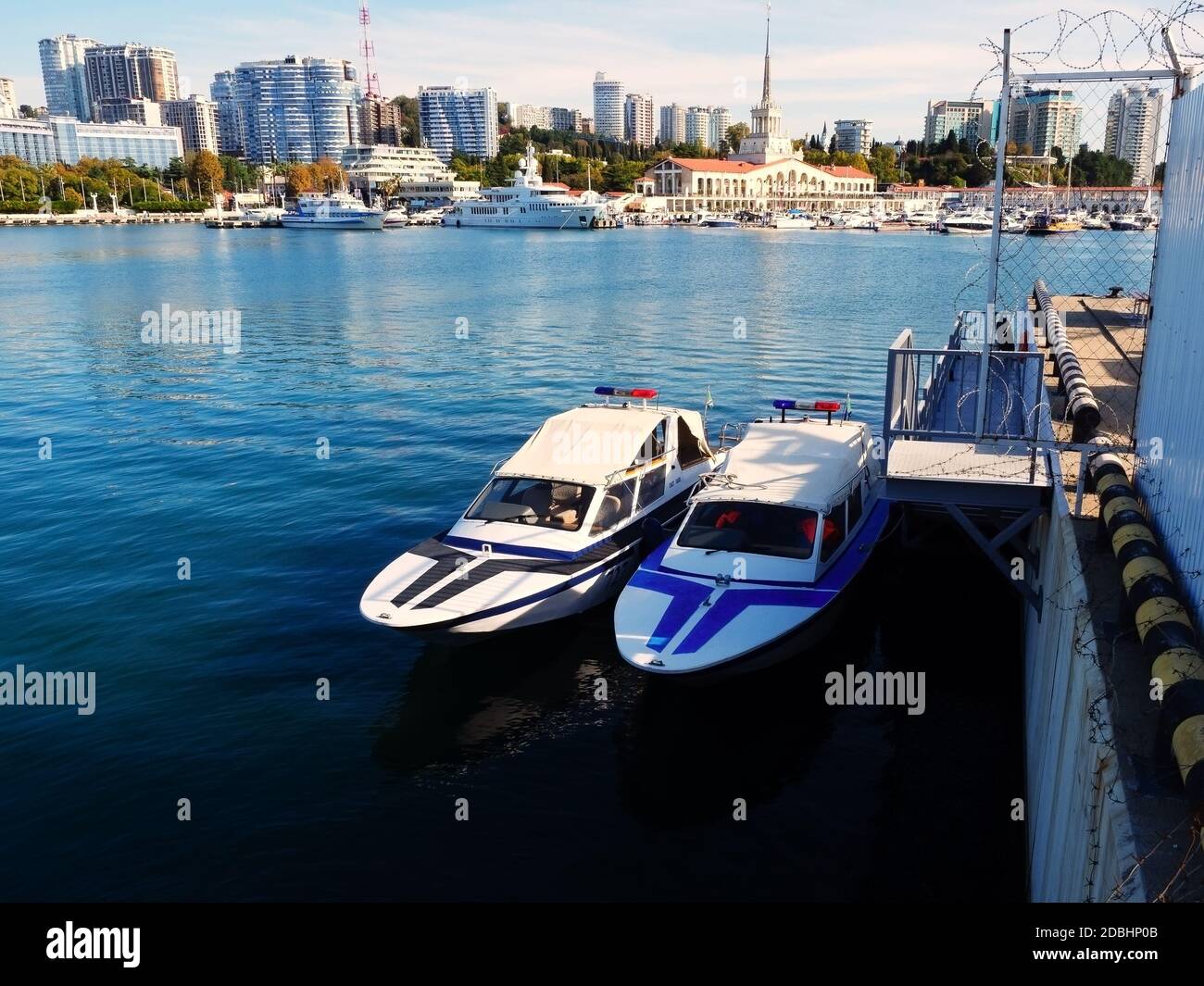Two patrol boats are parked in the sea against the background of the ...
