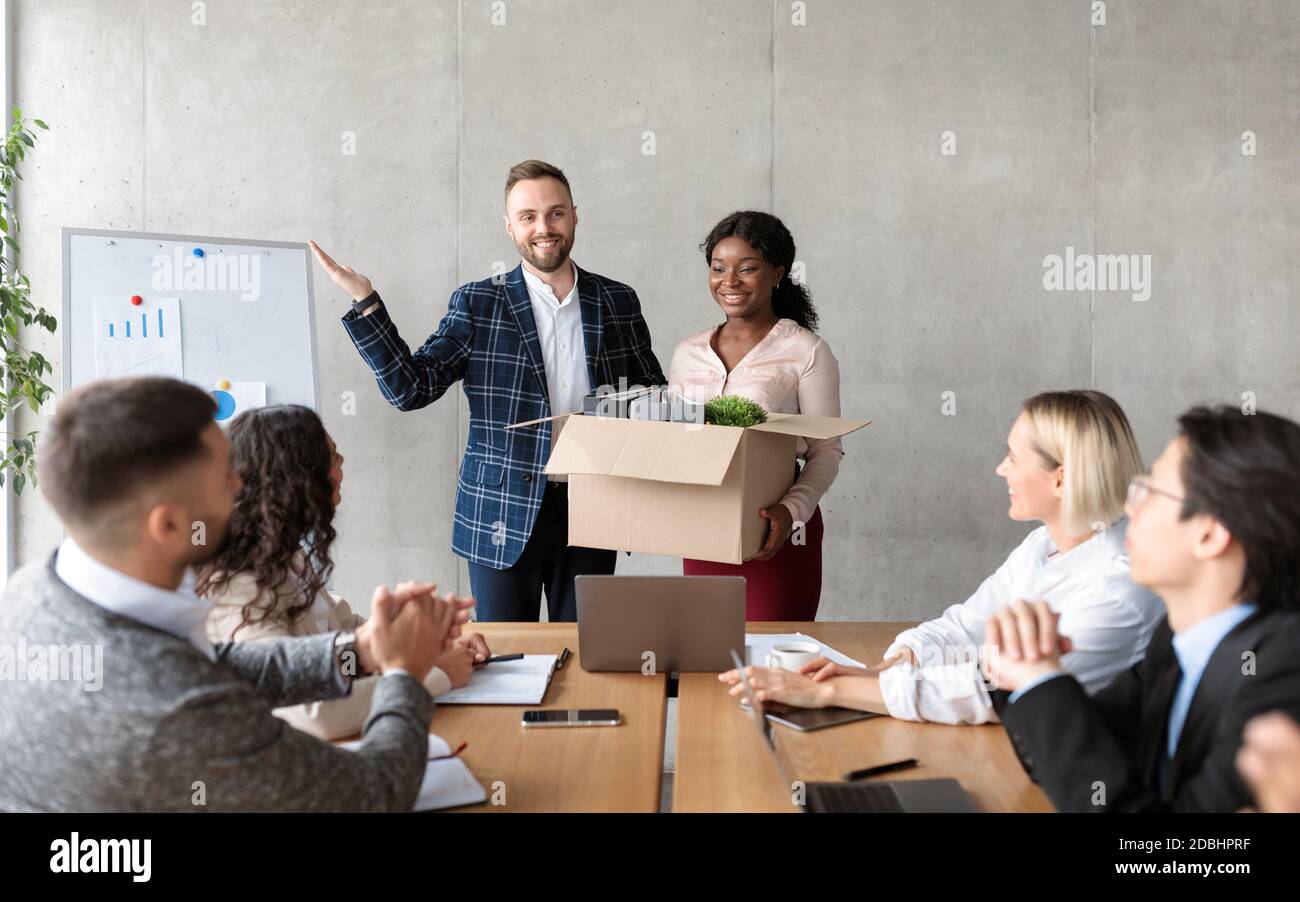 HR Manager Introducing New Female Employee To Colleagues In Office ...