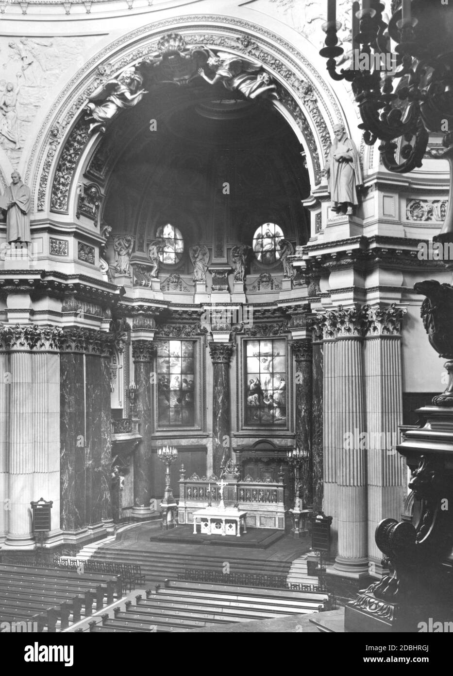 The photograph shows the Berlin Cathedral with marble altar in the apse ...