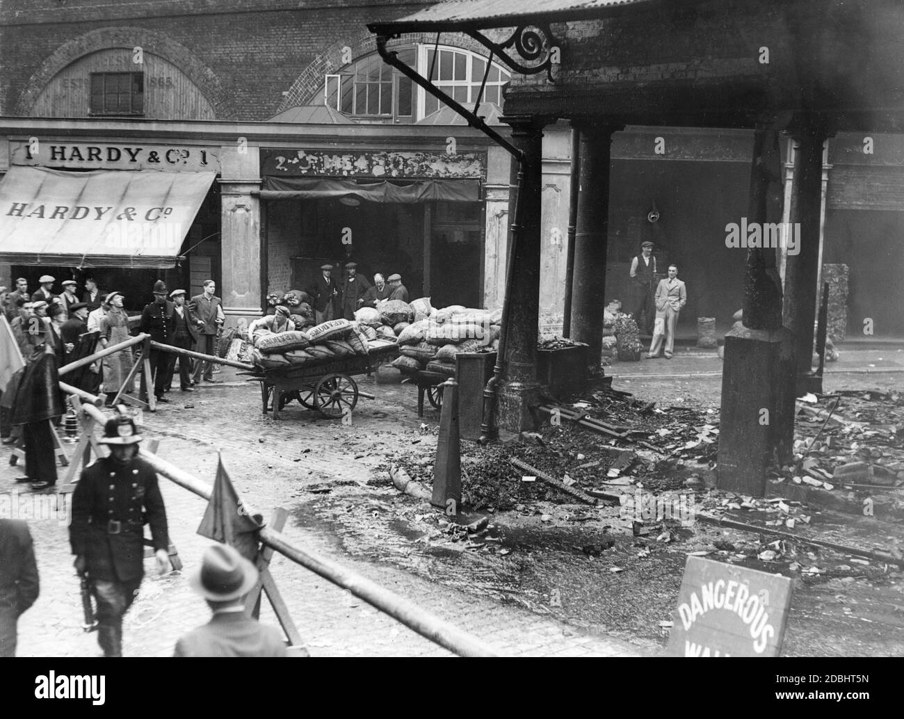 A burnt-out stand at Borough Market in the London borough of Southwark ...