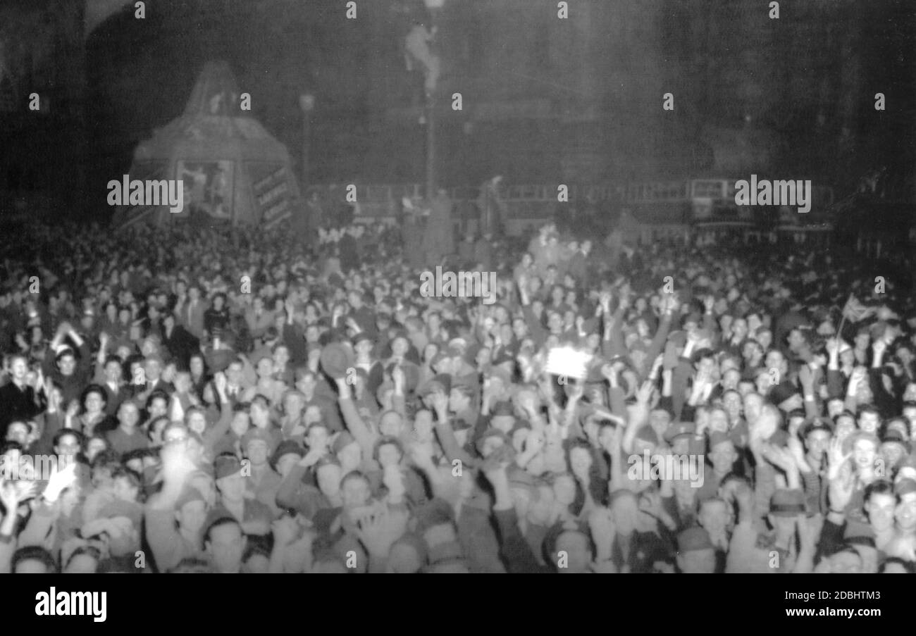 A large crowd of people has gathered on London's Piccadilly Circus to ...
