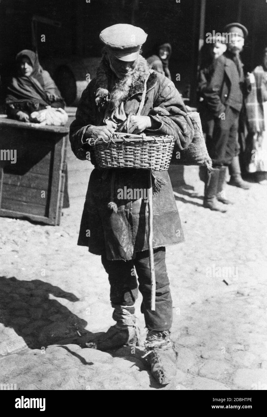 Jewish match trader in the ghetto of Vilnius, after the invasion of ...