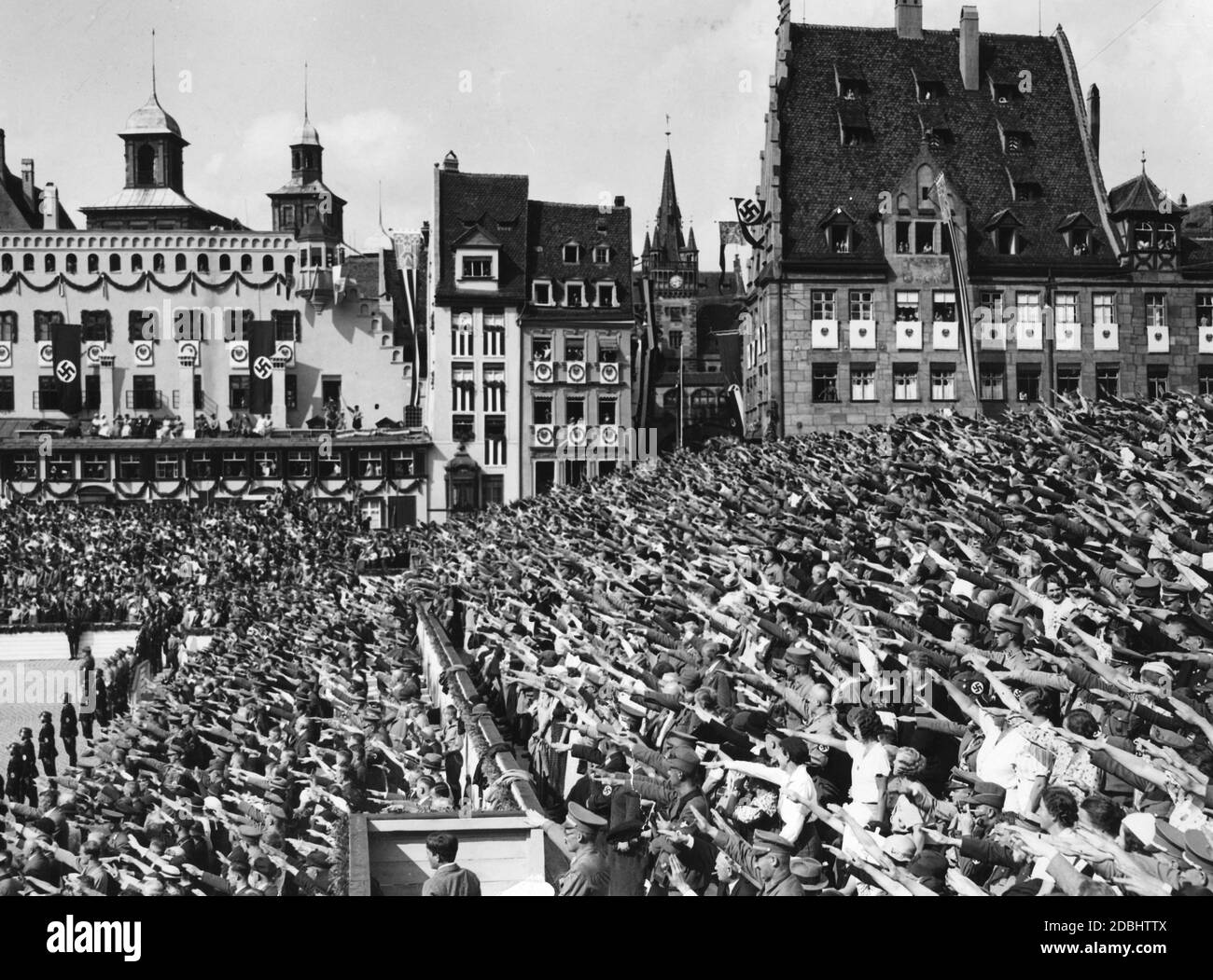 View of the spectator stands during the march of the NS Labor Service ...