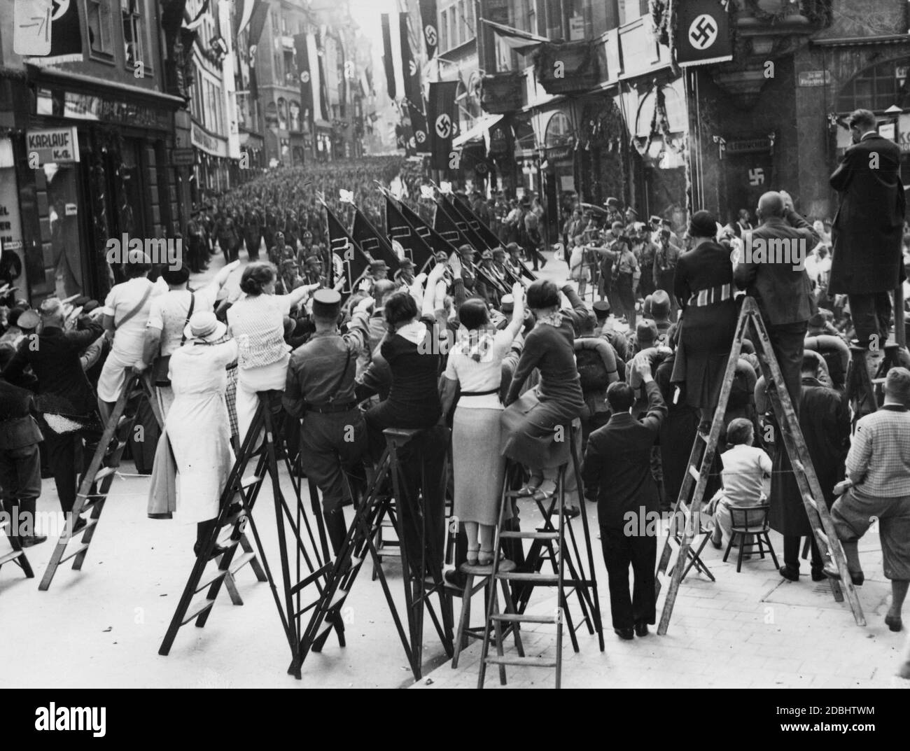 "Spectators at the parade of the Reich Labor Service during the Nazi ...