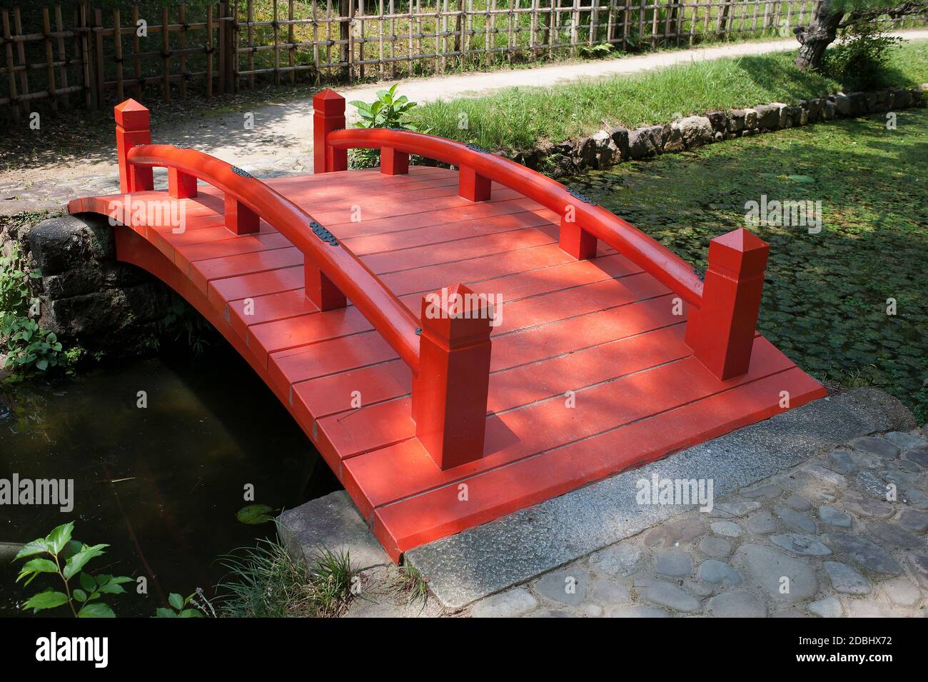 Garden traditional Japanese red bridge, Japan Stock Photo - Alamy