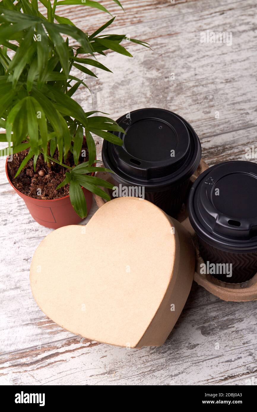 Heart shaped cardboard box and cups of coffee Stock Photo - Alamy