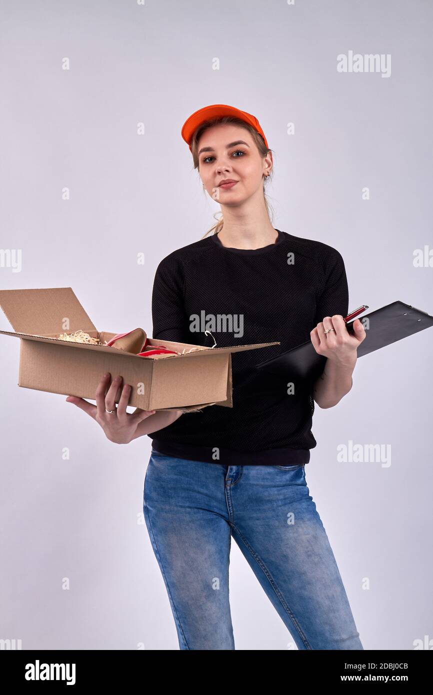 American delivery woman with parcel and documents Stock Photo - Alamy