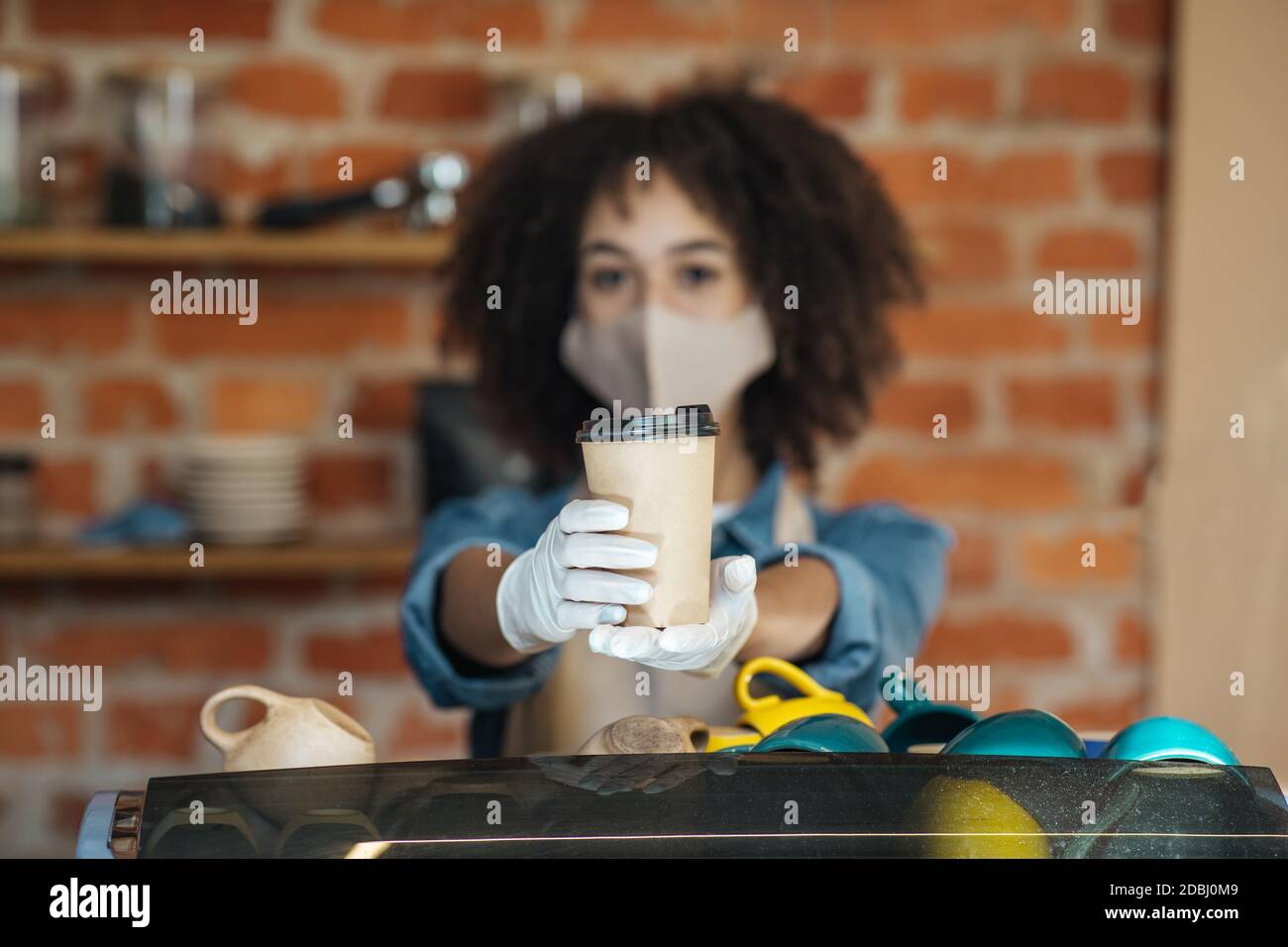 Social distancing and coffee takeaway during covid-19 pandemic Stock ...