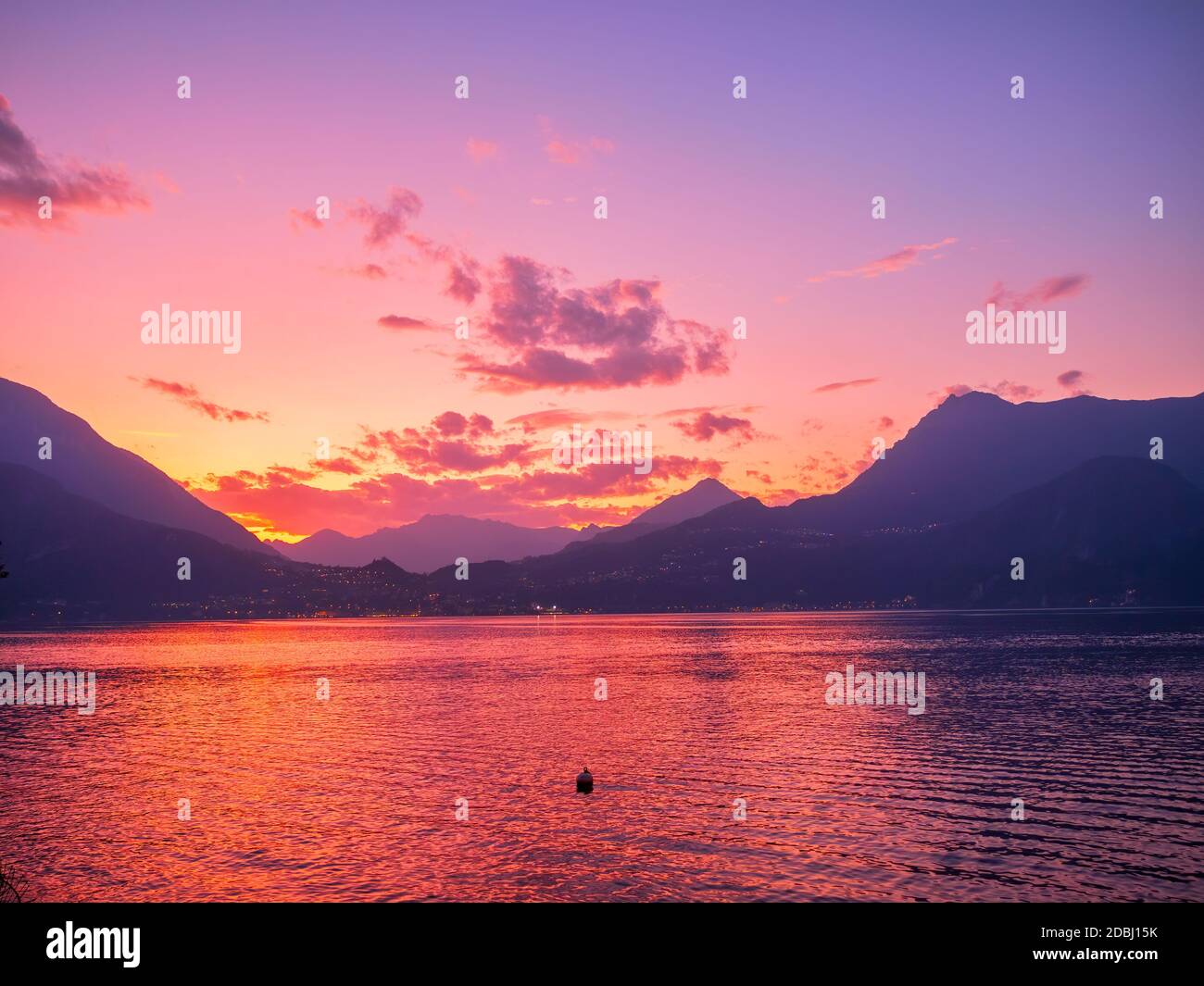 Amazing sunset behind Alps mountains and Como lake, Italy Stock Photo ...