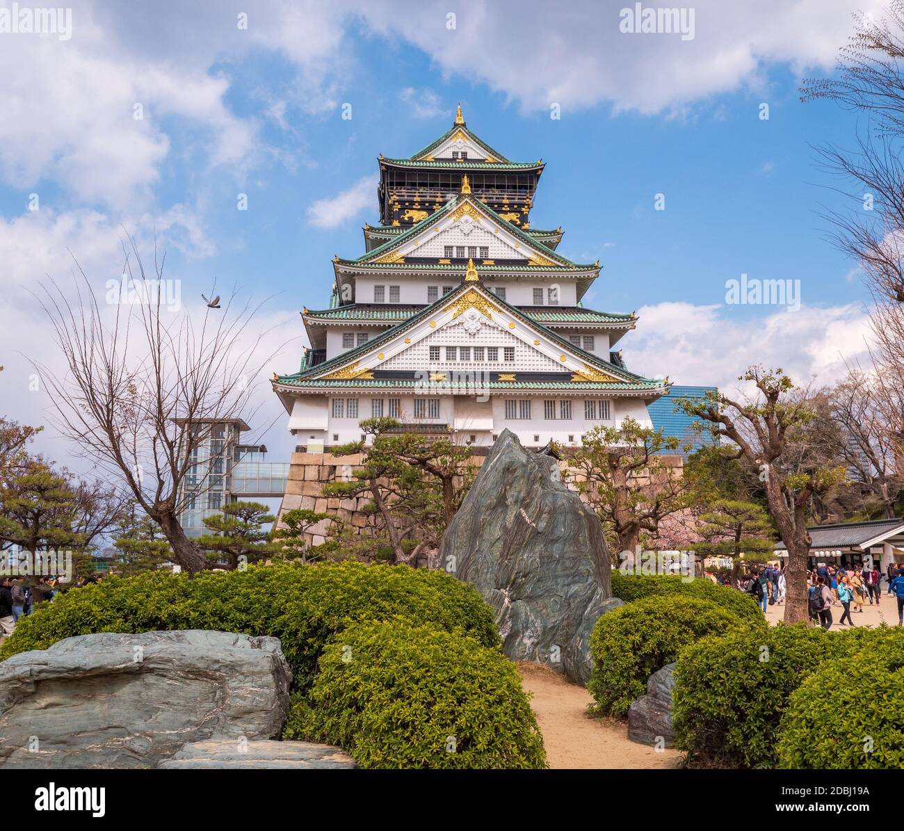 OSAKA, JAPAN- APRIL, 2019: Tourists walking around the Osaka Castle ...