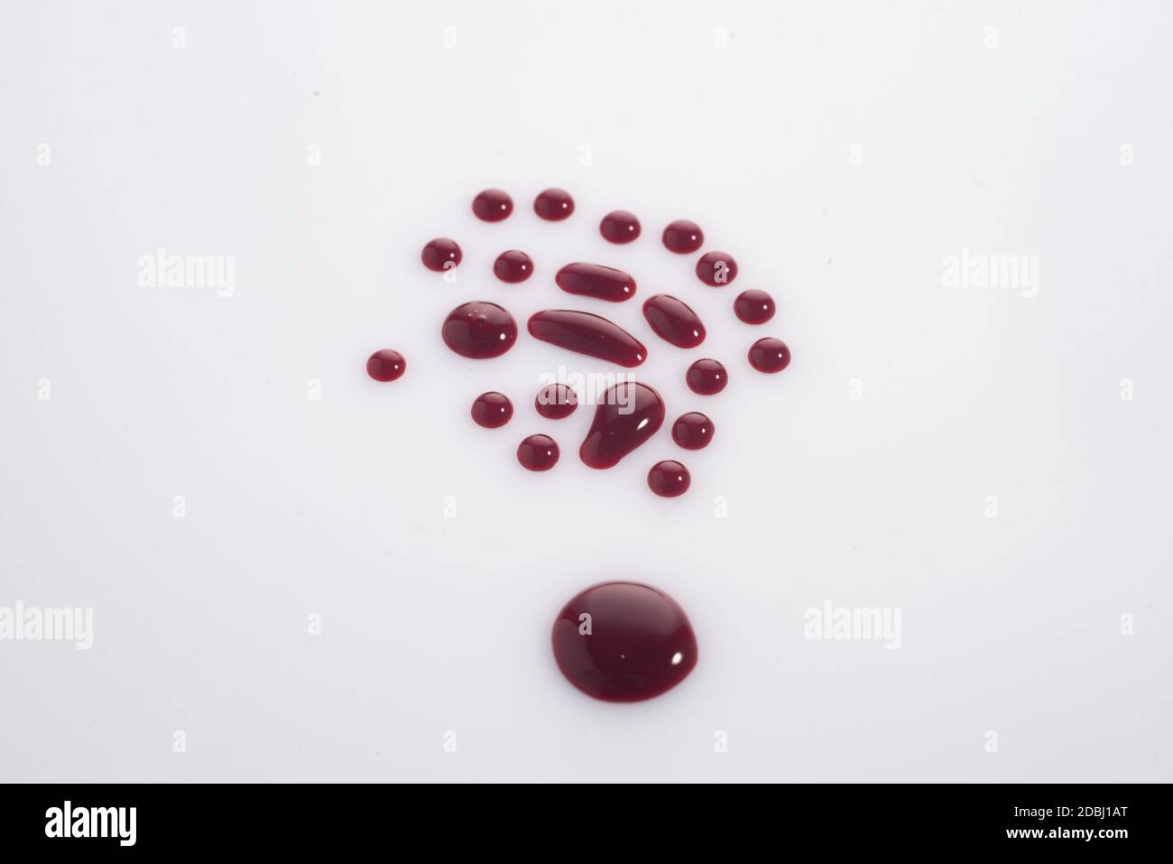 drops of blood, on a white background. view from above drop of blood ...