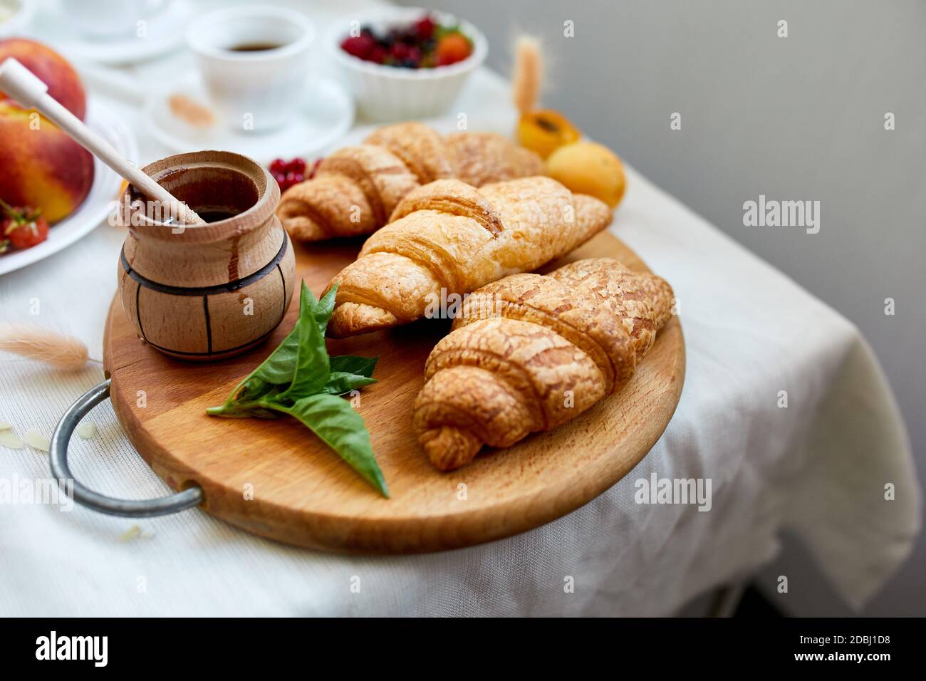 Continental breakfast table served with traditional French croissant ...