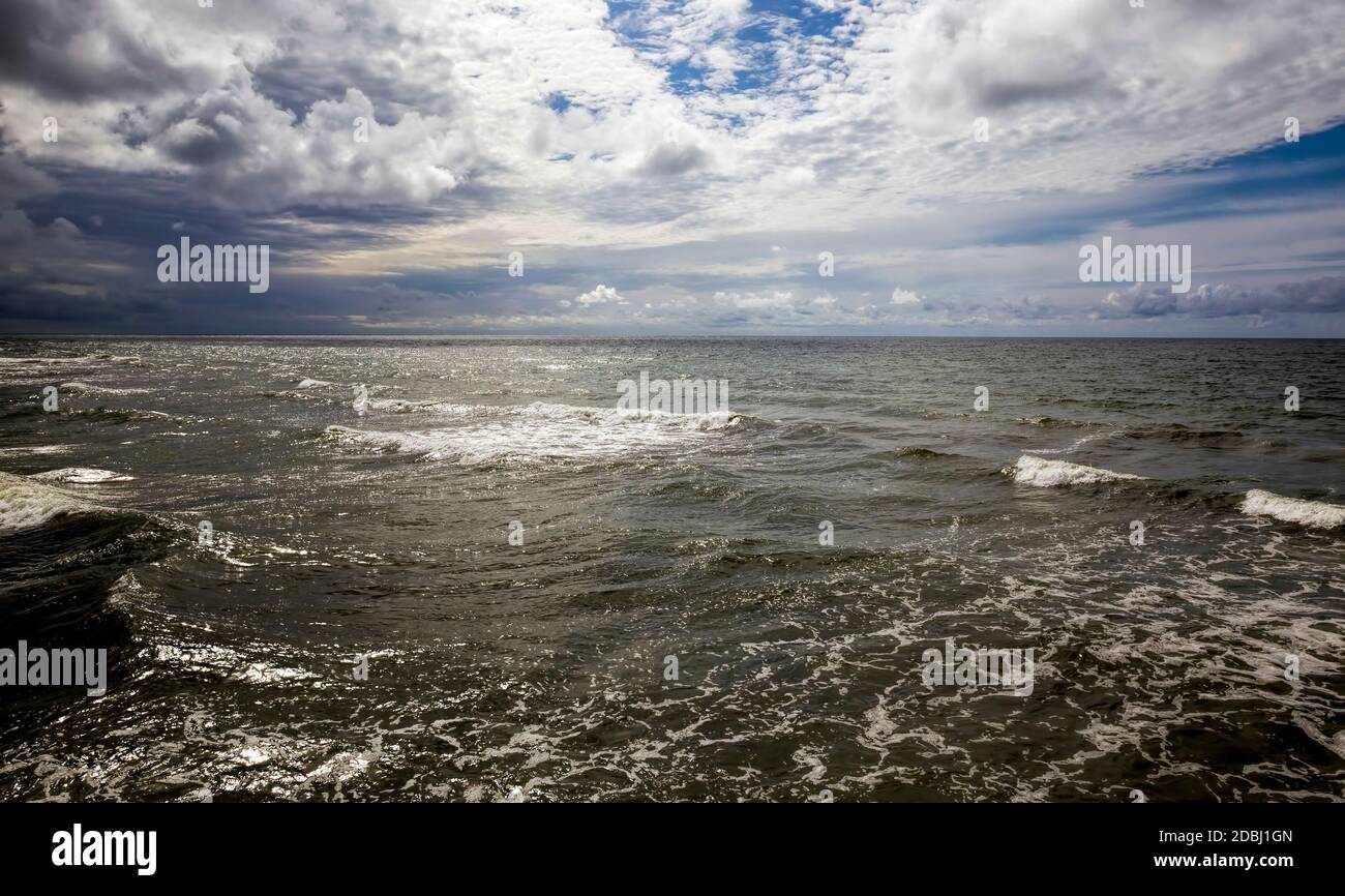 water surface on the sea with foam and waves from windy weather ...