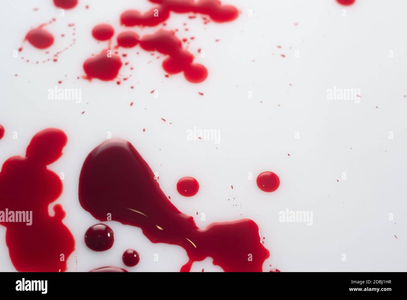drops of blood, on a white background. view from above drop of blood ...