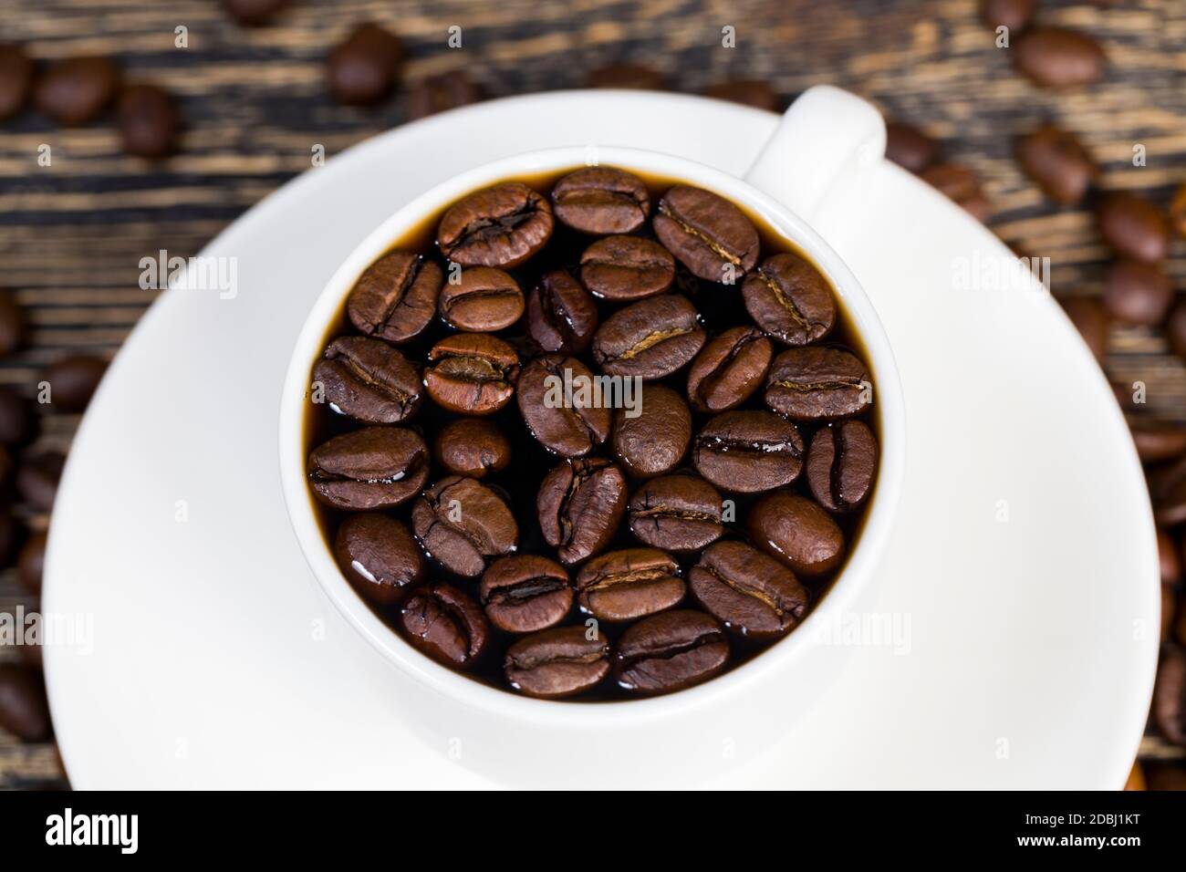 beautiful coffee beans coffee floating in brown cooked coffee drink ...
