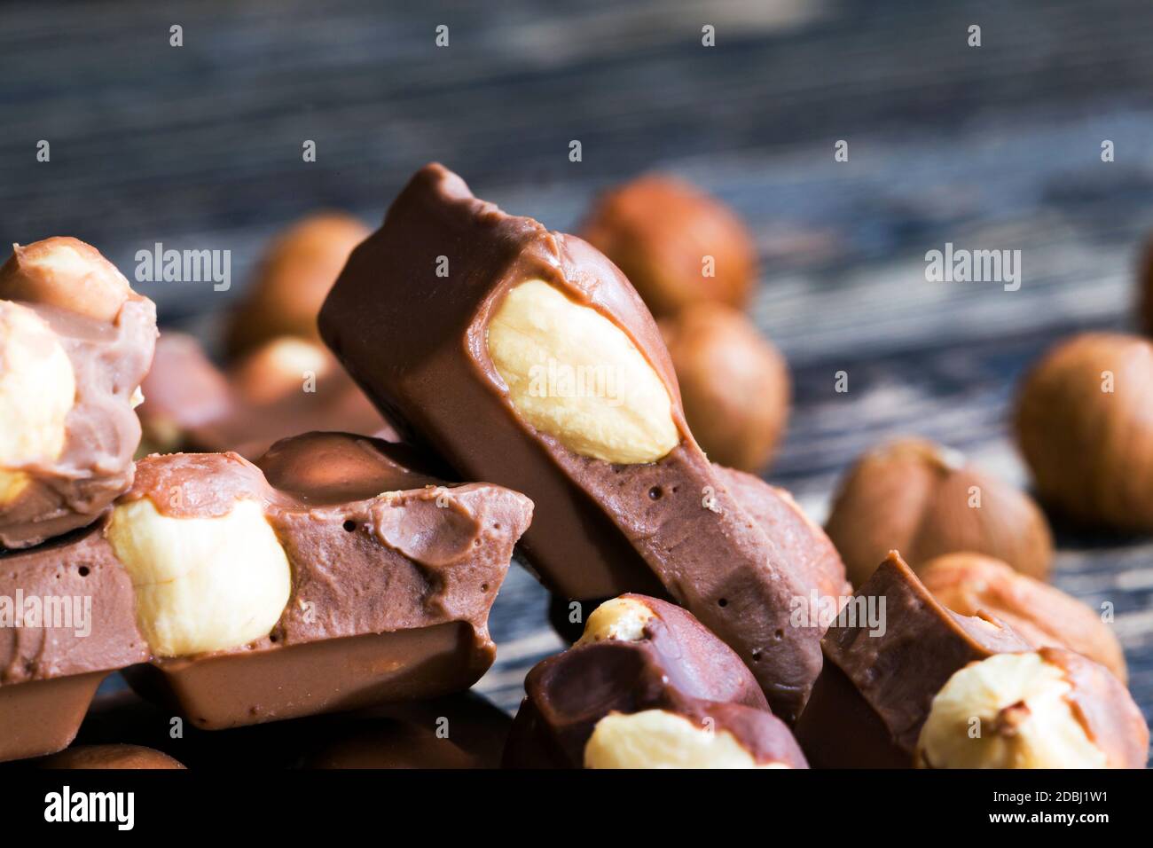 real quality milk chocolate with roasted hazelnut kernel, close-up of ...