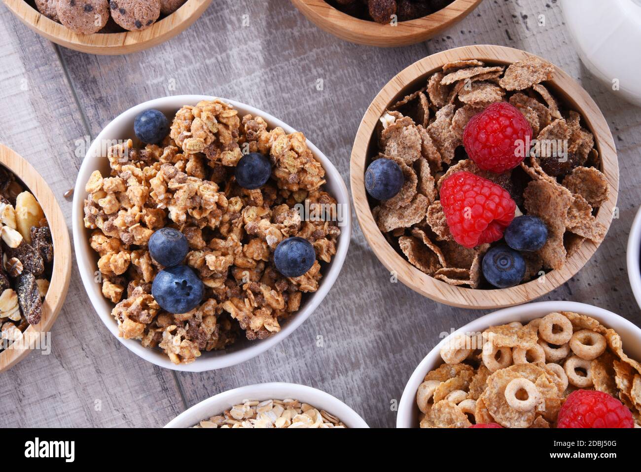 Bowls containing different sorts of breakfast cereal products Stock ...