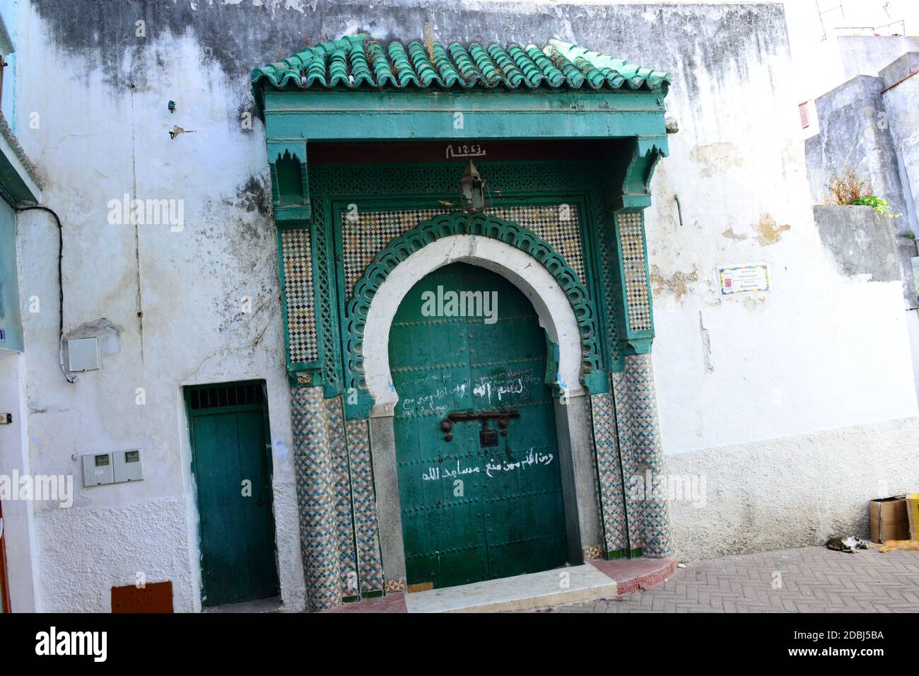 Green wooden gate of ancient mosque in Medina. Tangier, Morocco Stock ...