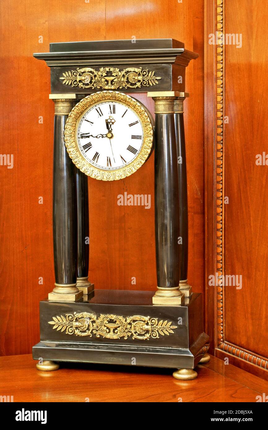 Old roman tabletop clock with lot of details Stock Photo - Alamy