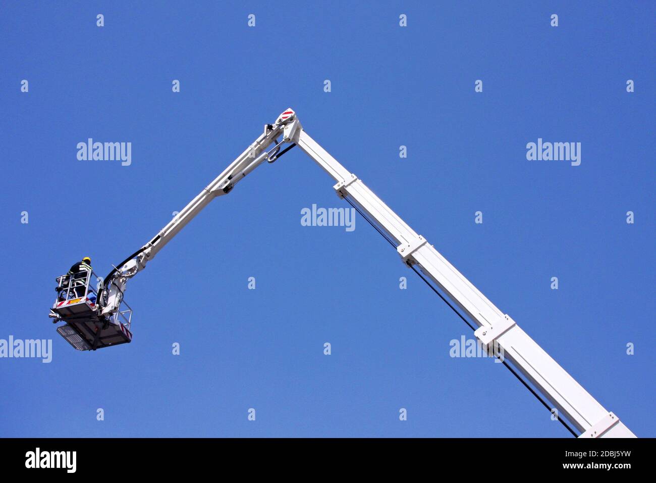 Fire fighter in long and tall crane Stock Photo - Alamy