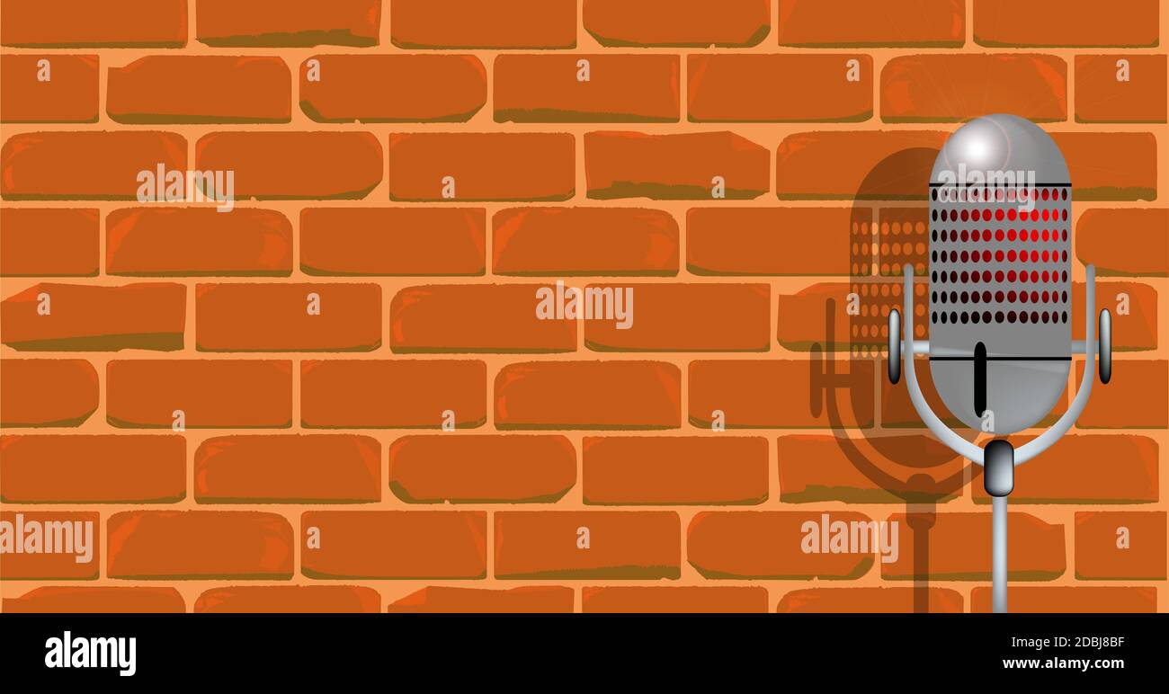A microphone ready on stage against a brick wall Stock Photo - Alamy