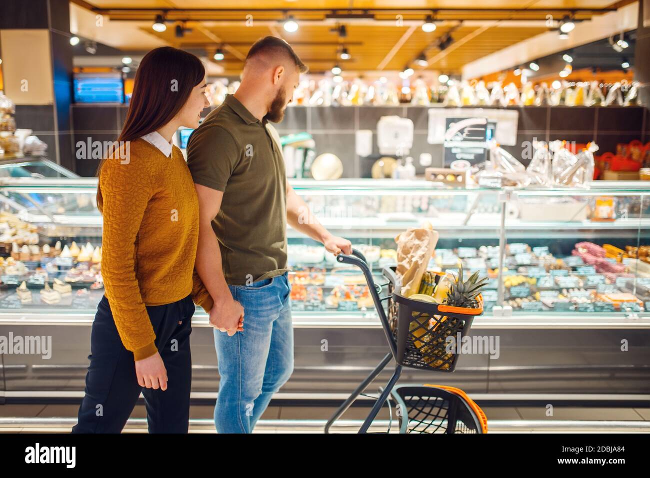 Two People Shopping Aisle Cart High Resolution Stock Photography and ...