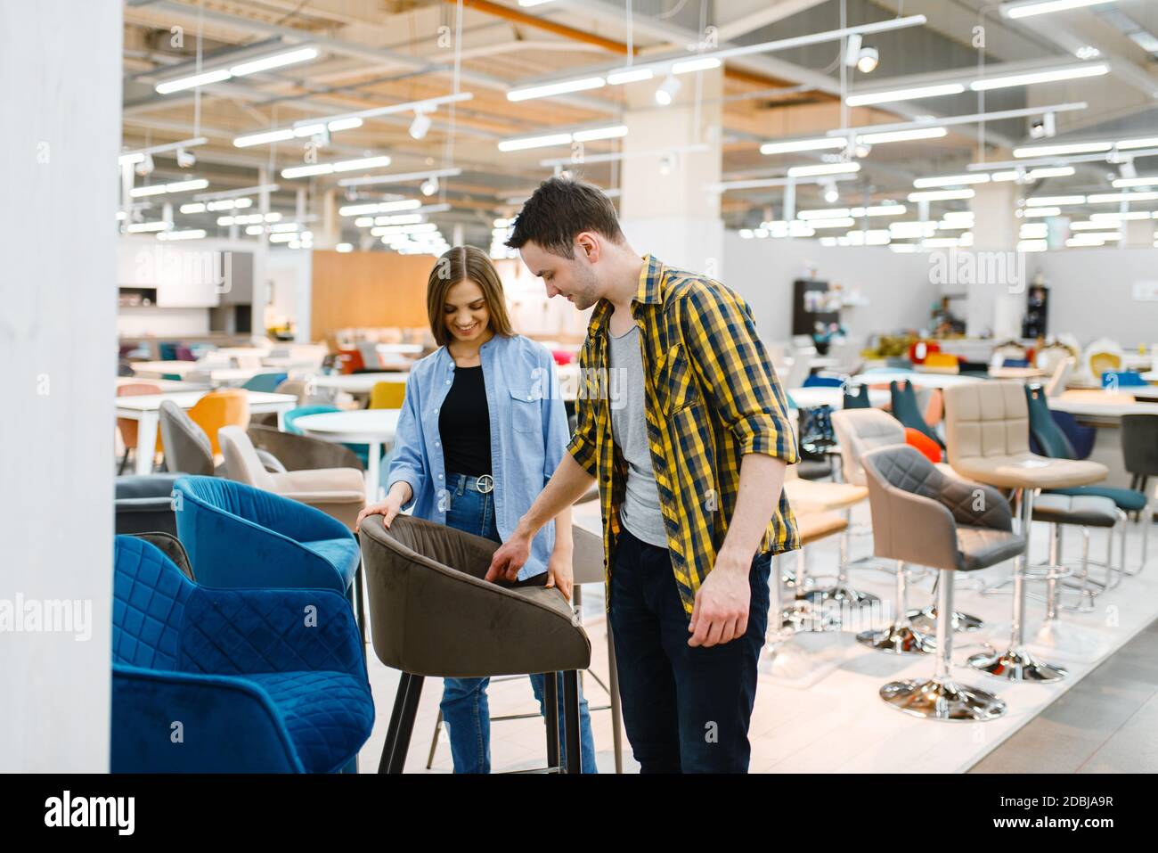 Woman sofa shop happy furniture hi-res stock photography and images - Alamy