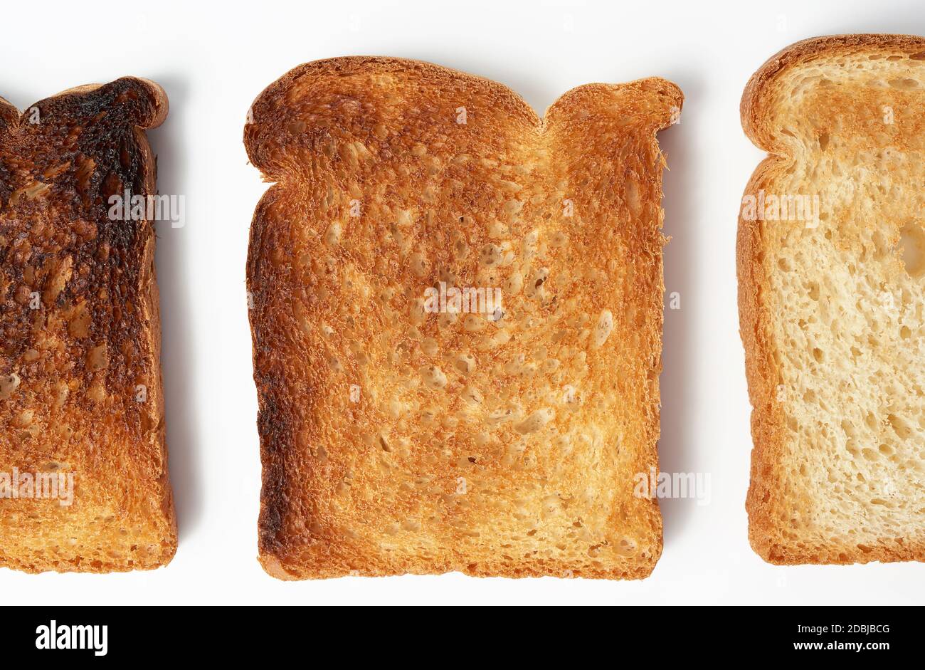 square slices of bread made from white wheat flour toasted in a toaster ...